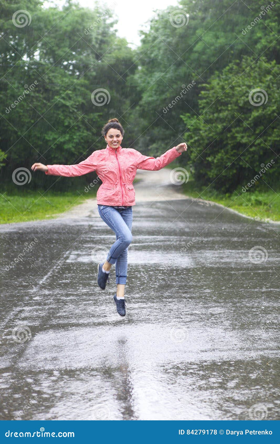 Rain City Happy Girl Jumping in the Puddle Stock Photo - Image of ...