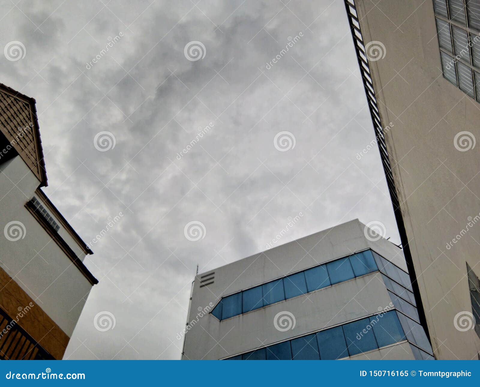 Rain Clouds between Buildings Stock Image - Image of force, gray: 150716165
