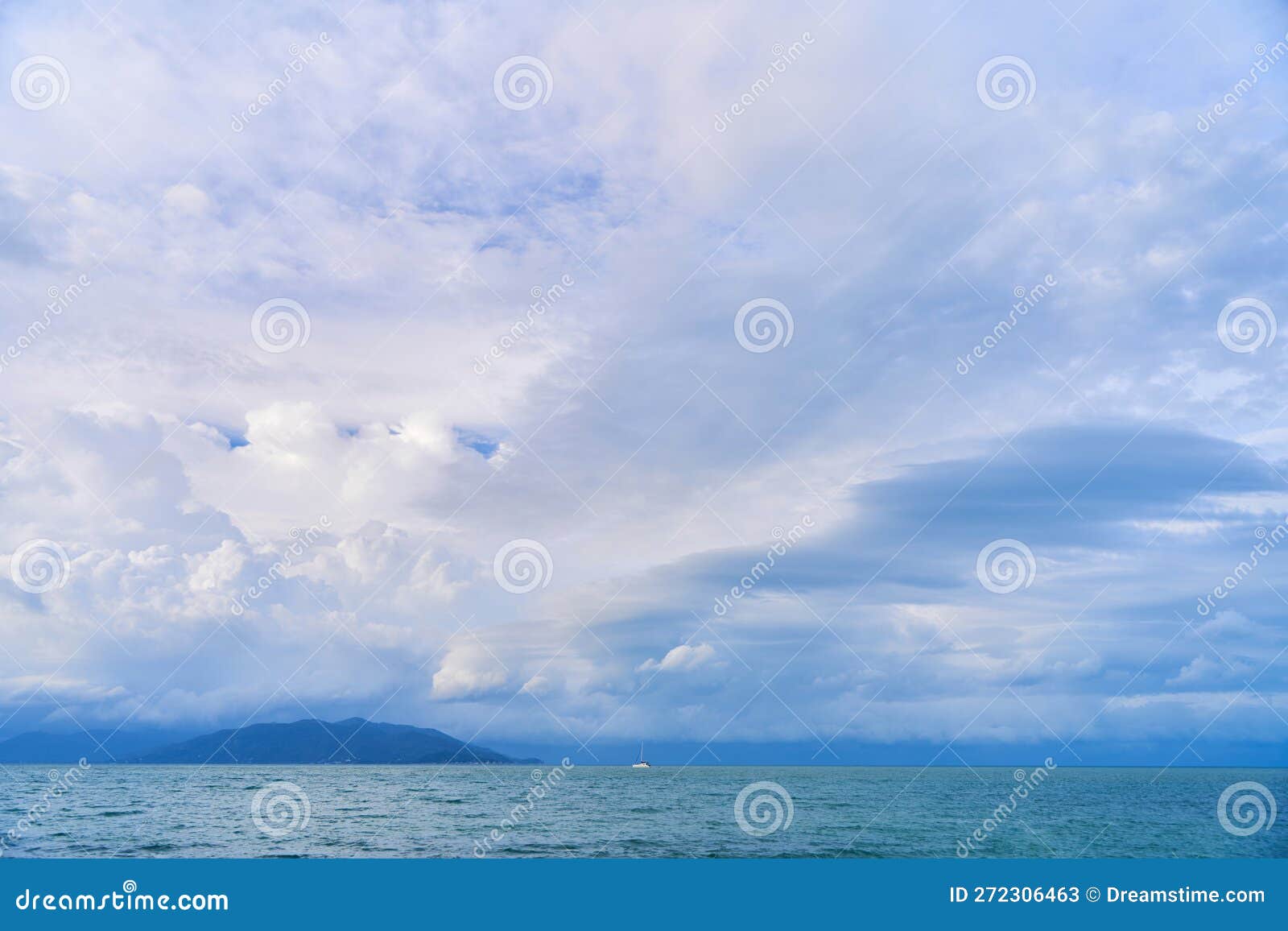 Rain Clouds Over an Island in the Sea. the Rain is Coming Stock Image ...