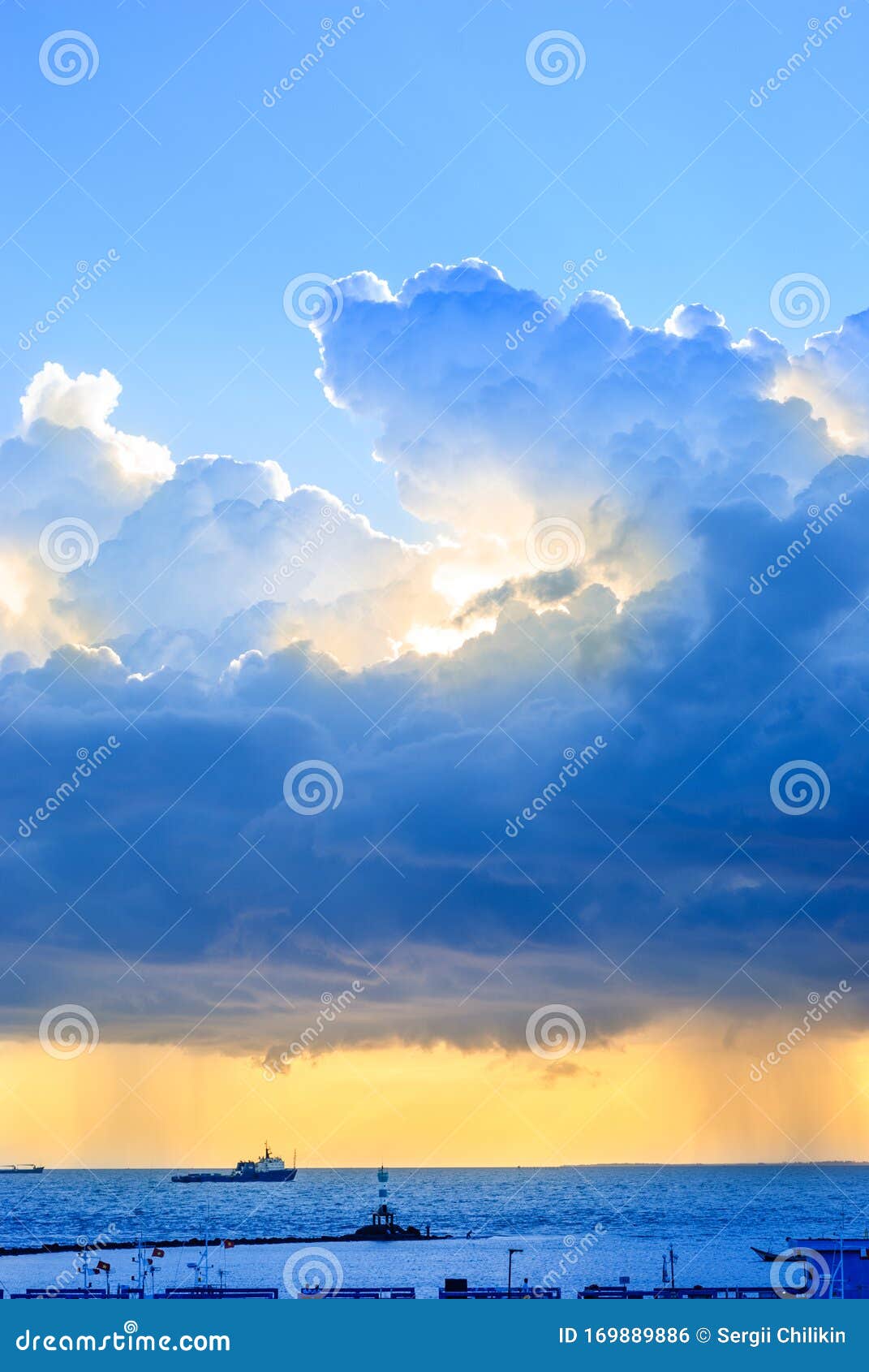 Rain clouds over the ocean stock photo. Image of rain - 169889886