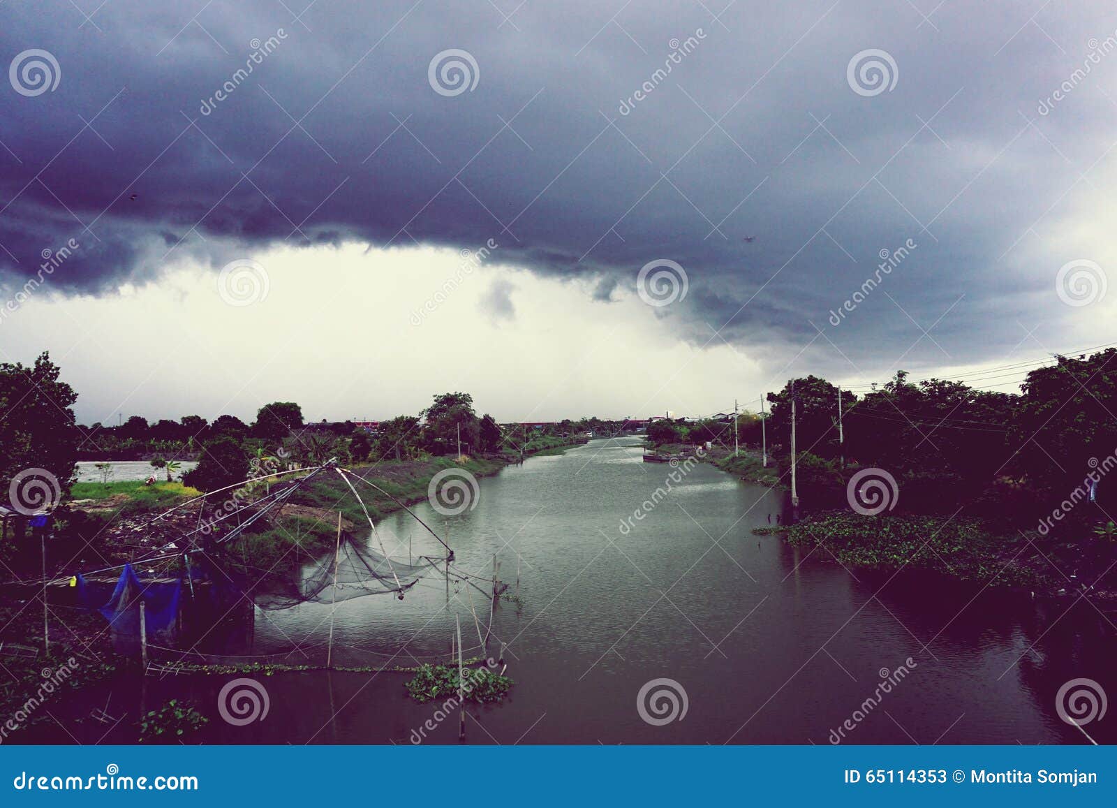 Rain coming soon stock image. Image of fishery, canal - 65114353