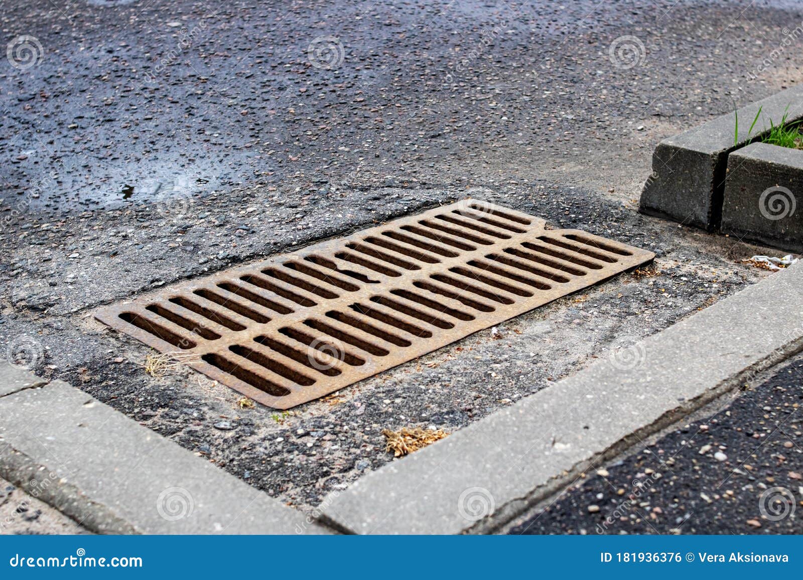 Rain Drainage Grid on the Road Closeup Stock Photo - Image of city ...