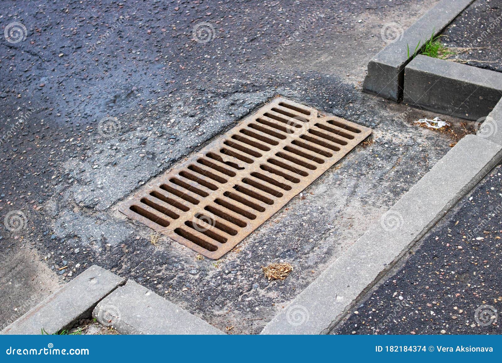 Rain Drainage Grid on the Road Closeup Stock Photo - Image of flood ...