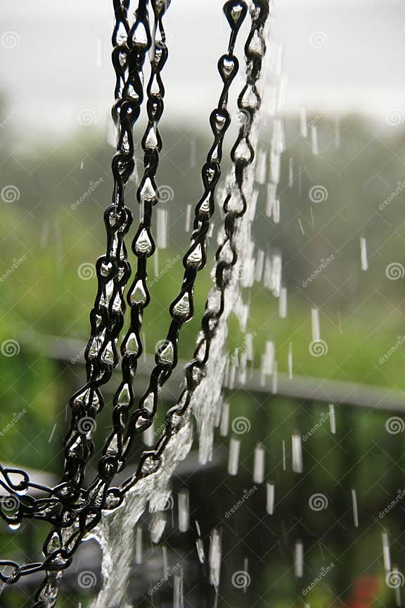 Rain dripping from a chain stock photo. Image of falling - 37112486