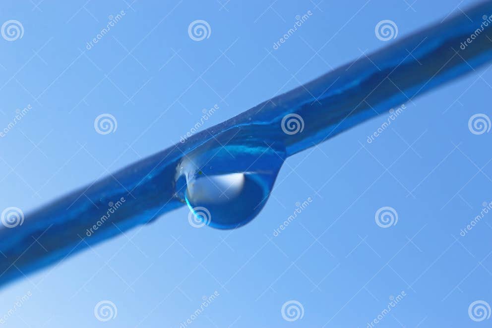 Rain Drop on a Blue Washing Line Stock Image - Image of rain, blue ...