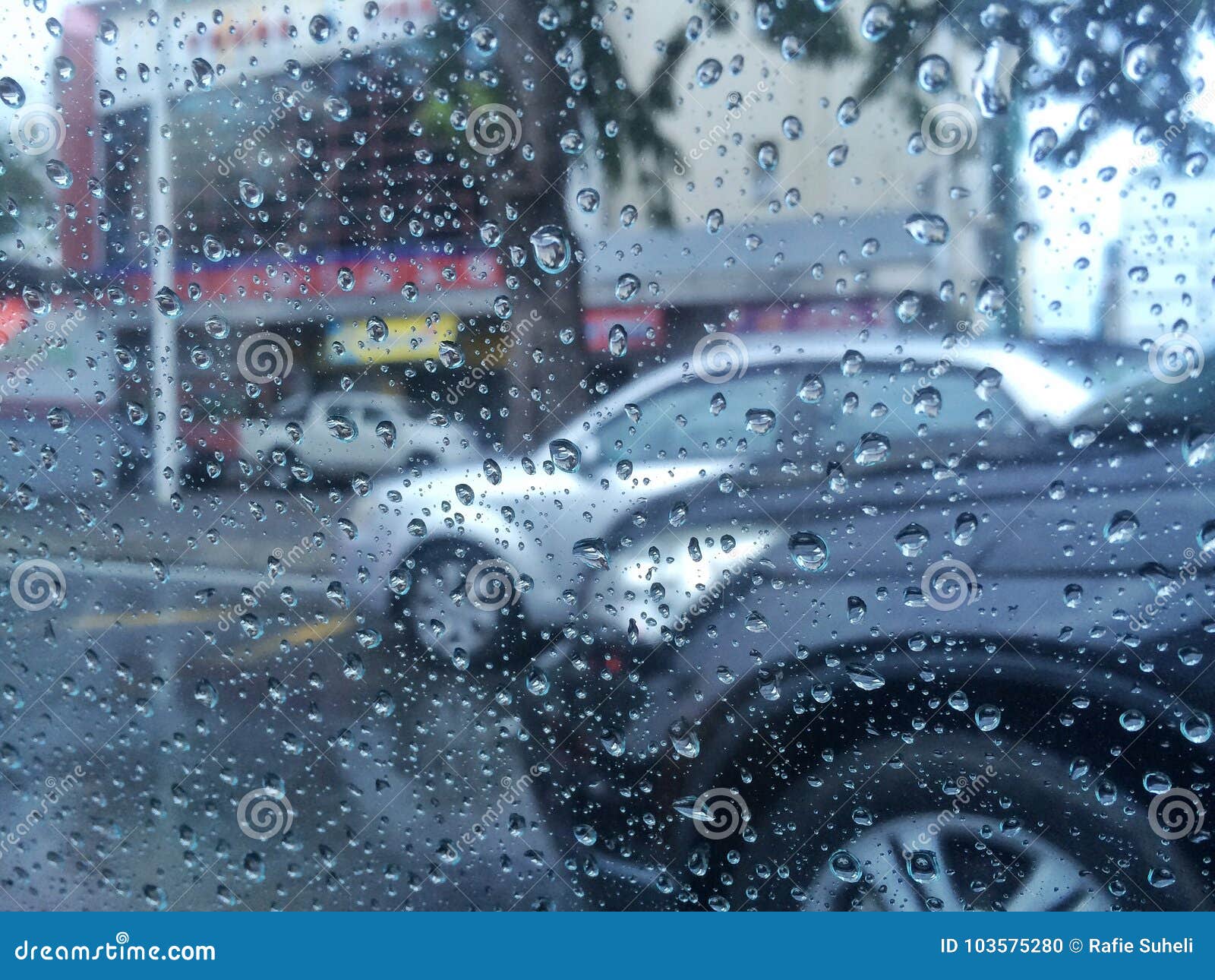 Rain Drop on Glass with Car on Road Stock Photo - Image of raindrop ...