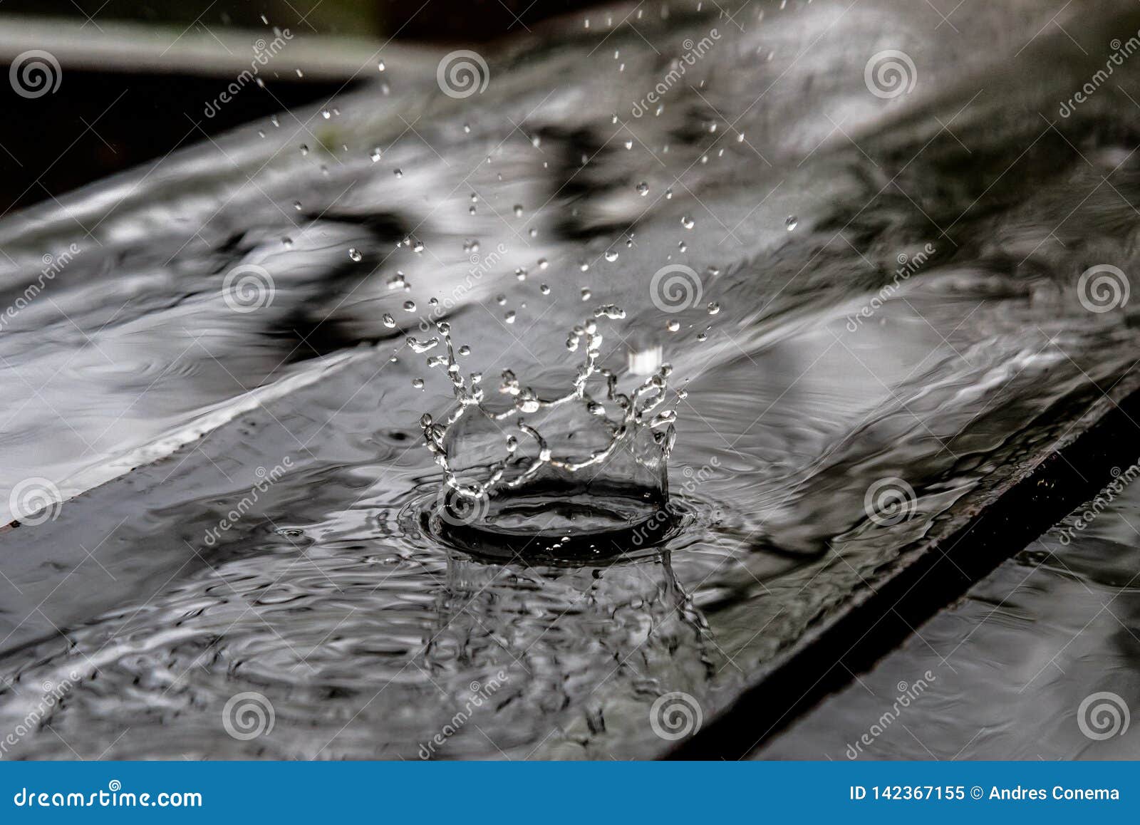 Rain Drop Splash in Wooden Floor Bouncing and Shaping a Water Crown ...