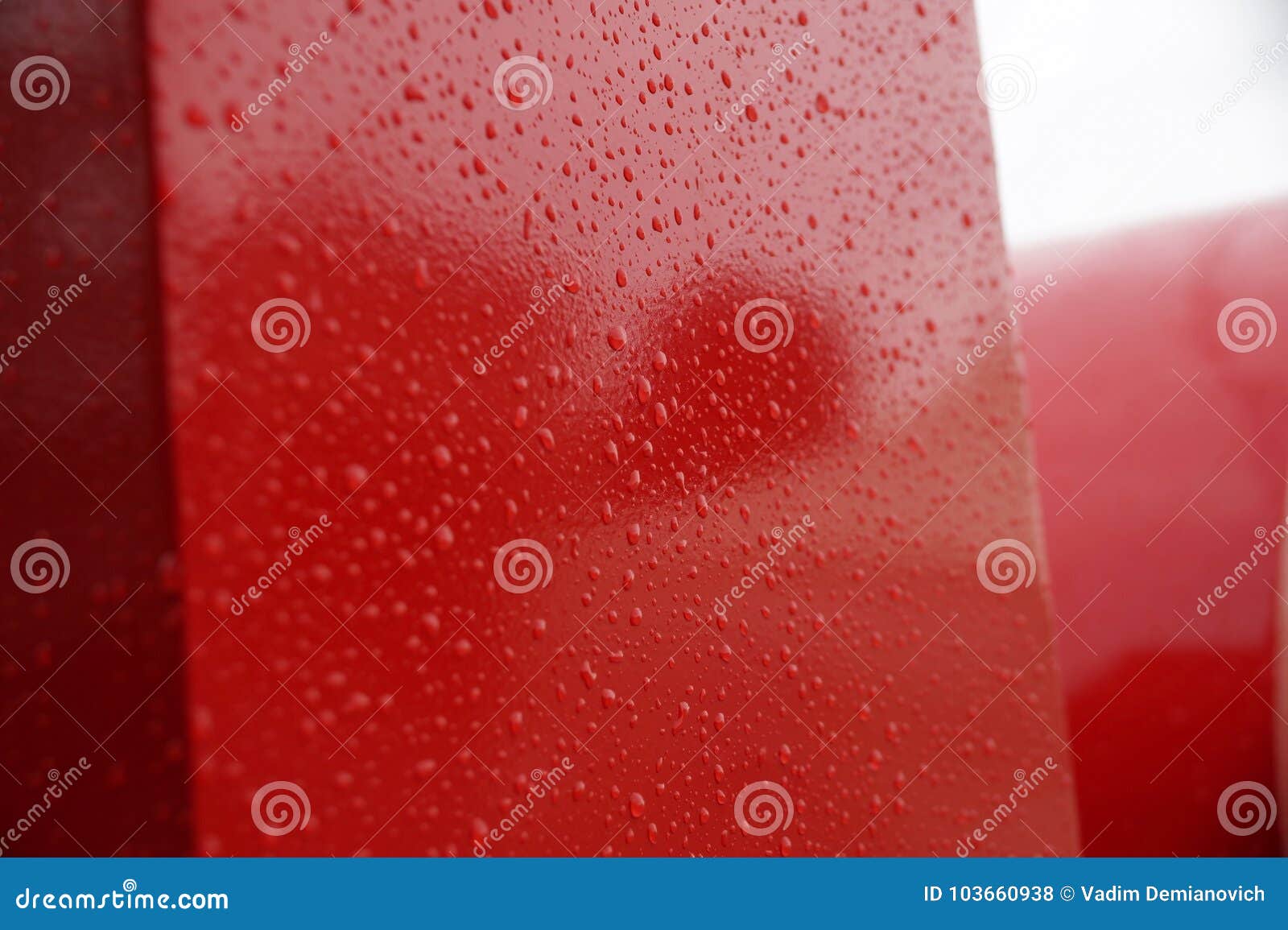 Rain Drops on a Surface of Red Color Stock Photo - Image of ...