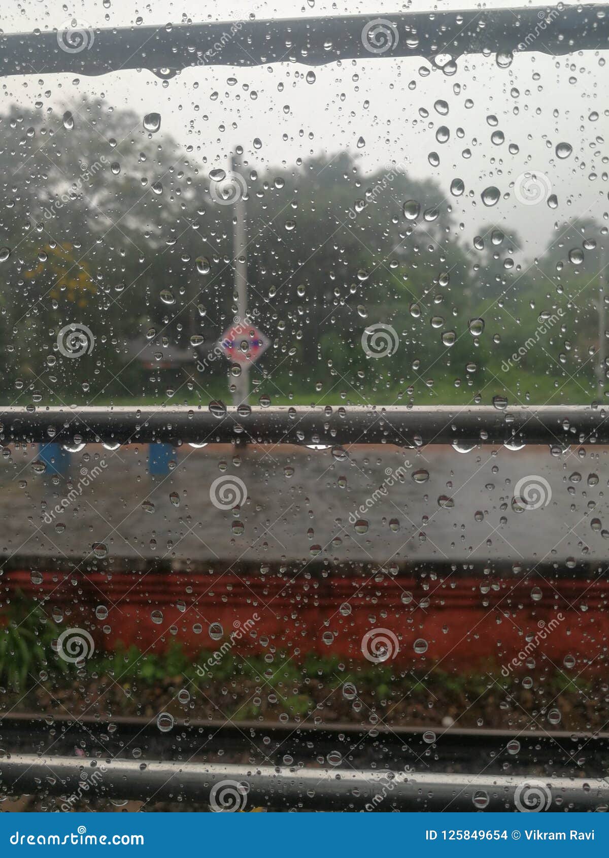 Rain stock photo. Image of rain, drops, train, platform - 125849654
