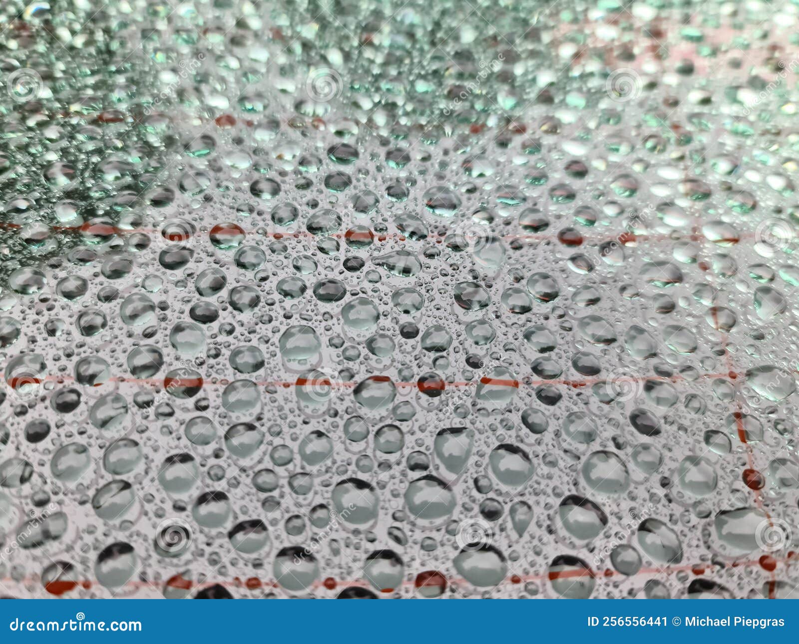Rain Drops on a Black Metallic Surface in a Closeup View Stock Image ...