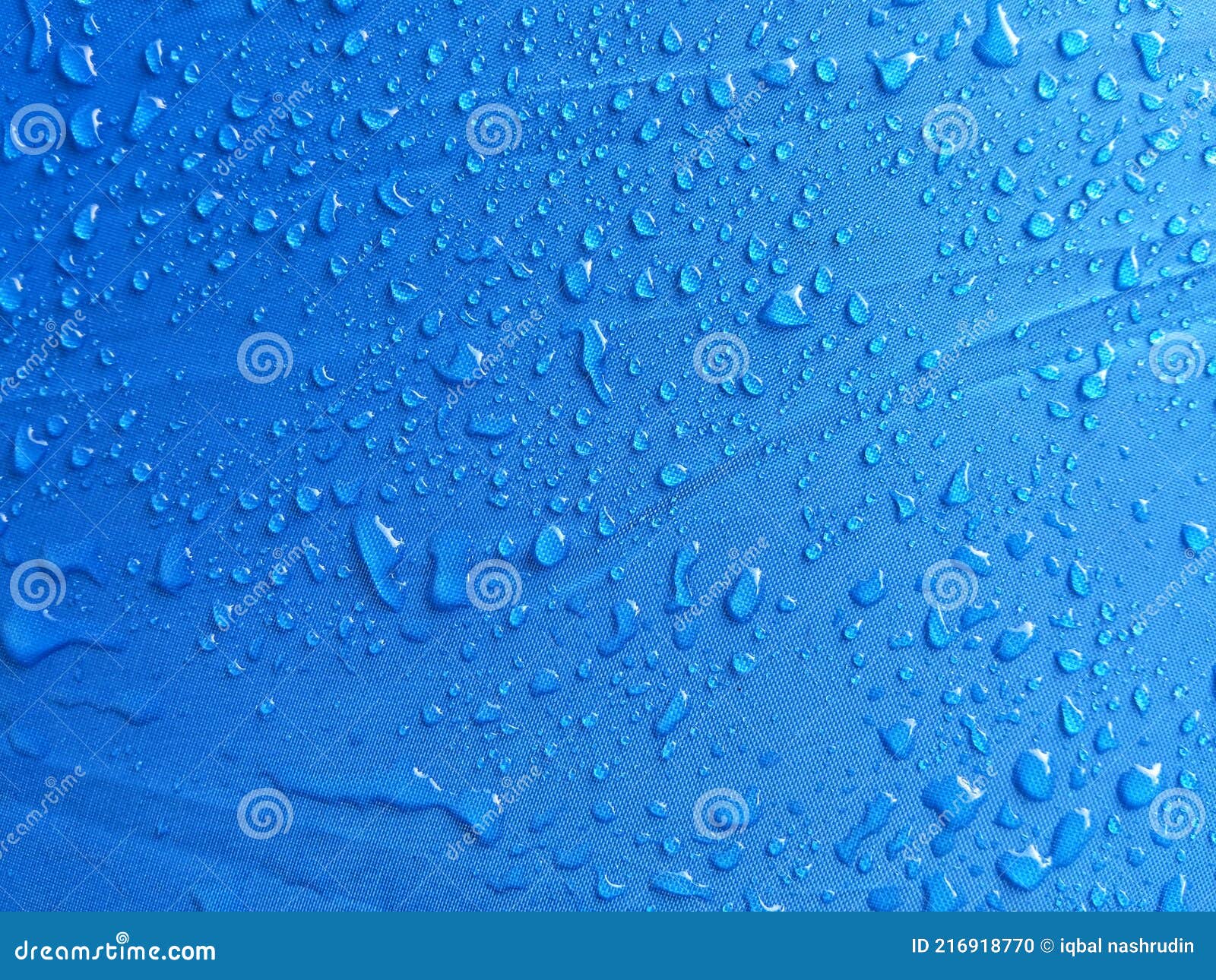 Rain drops blue stock photo. Image of blue, rain, ocean - 216918770
