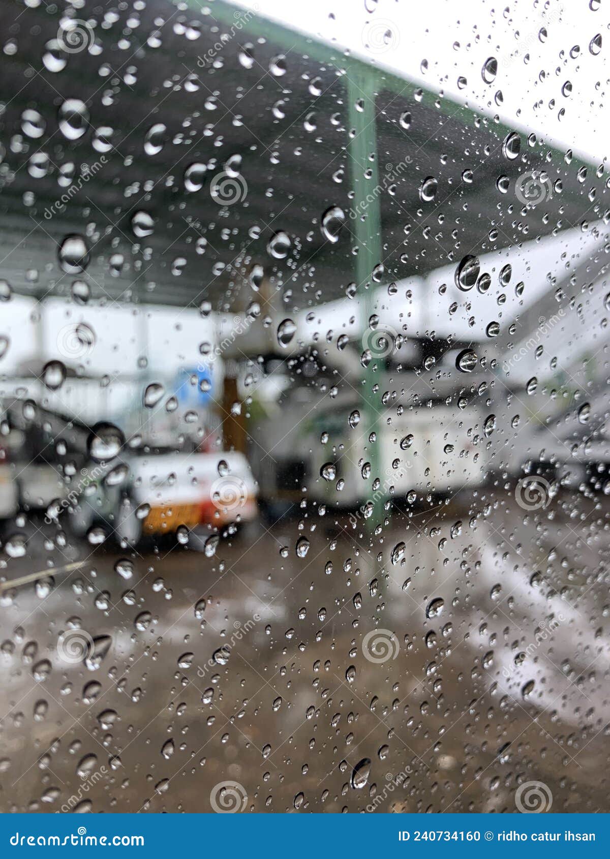 Rain drops on car window stock photo. Image of pattern - 240734160