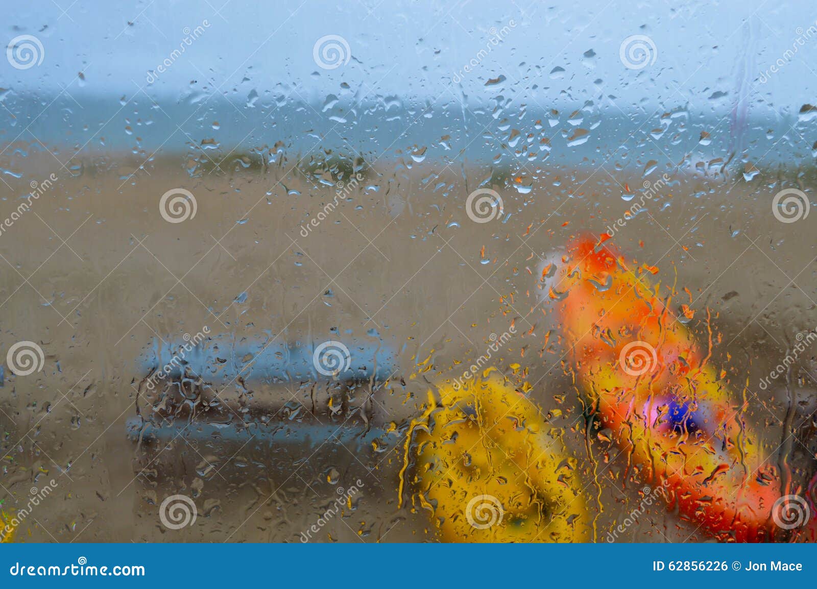 Rain Drops Drip Down Window of Beach Hut. Stock Photo - Image of view ...
