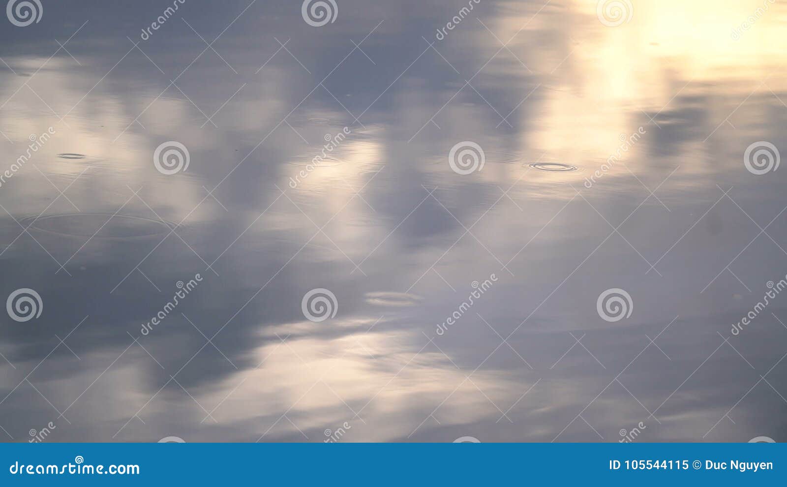 Rain Drops Falling on a Lake in Golden Sunset Reflection Stock Video ...