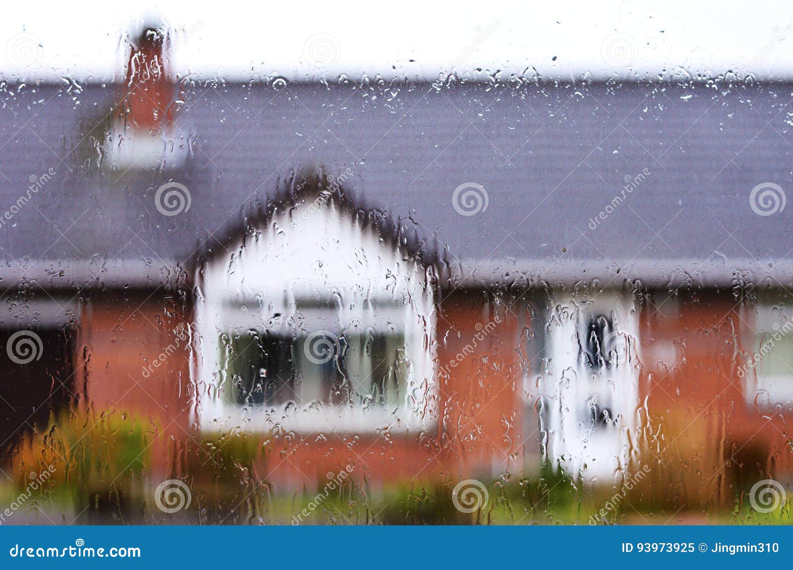 Rain Drops on Glass Window. House Blurred at Background Stock Image ...