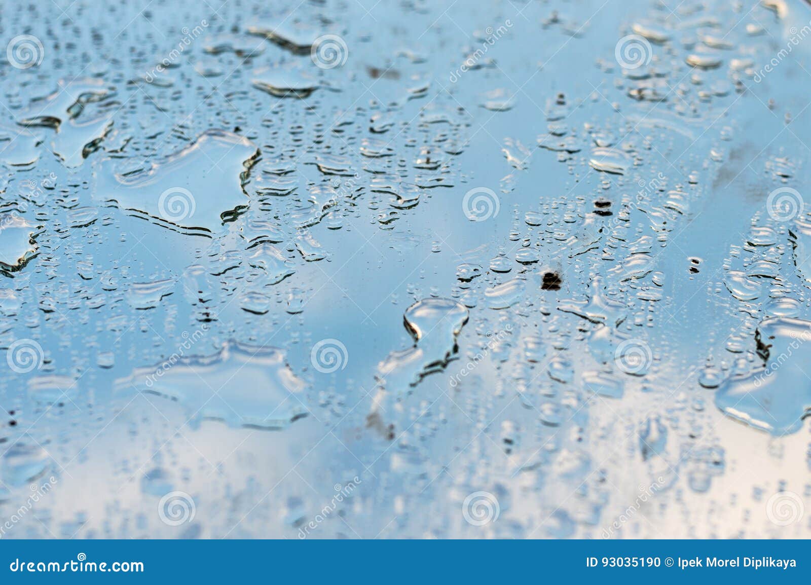 Rain Drops on a Mirror Left Outside. Stock Photo - Image of rain ...