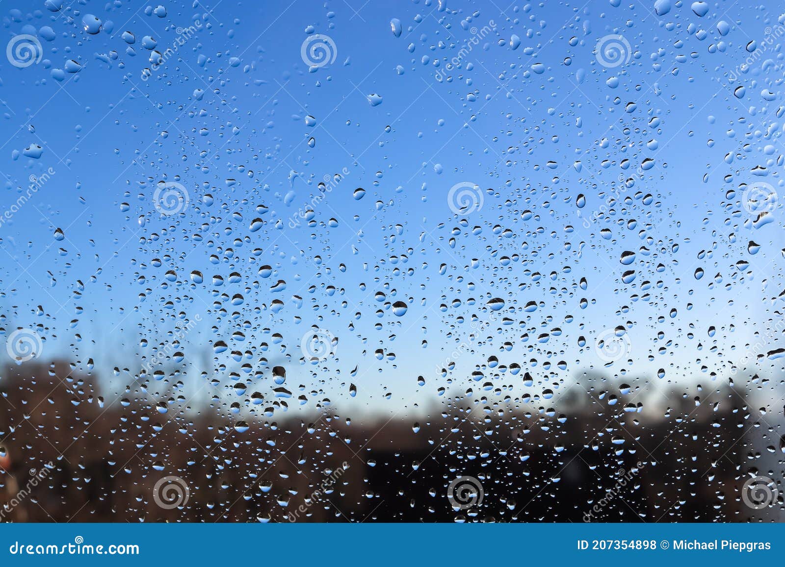 Rain Drops Running Down a Window in a Close Up View Stock Photo - Image ...