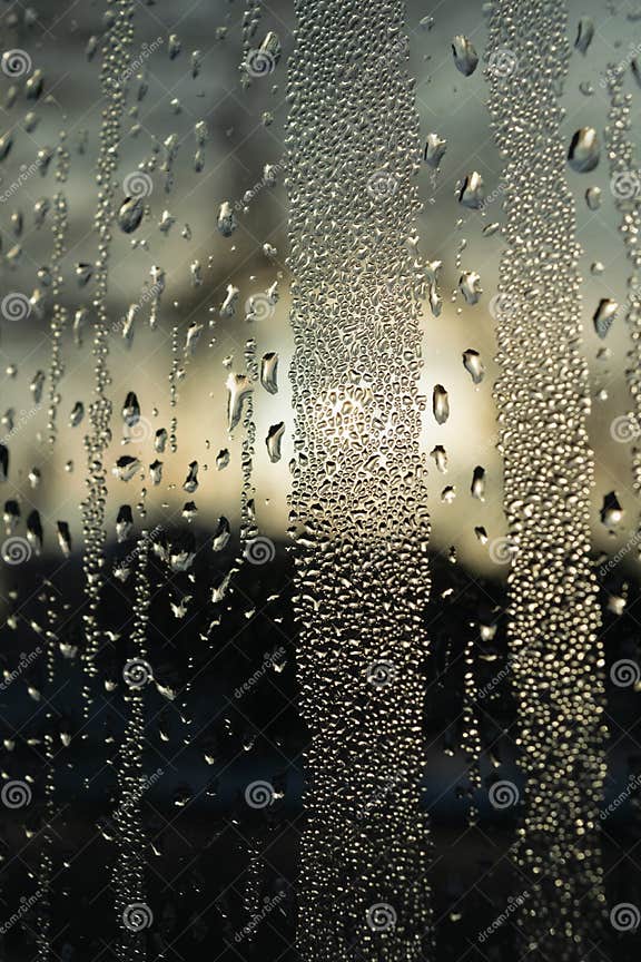 Rain Drops Running Down a Window in a Close Up View Stock Photo - Image ...