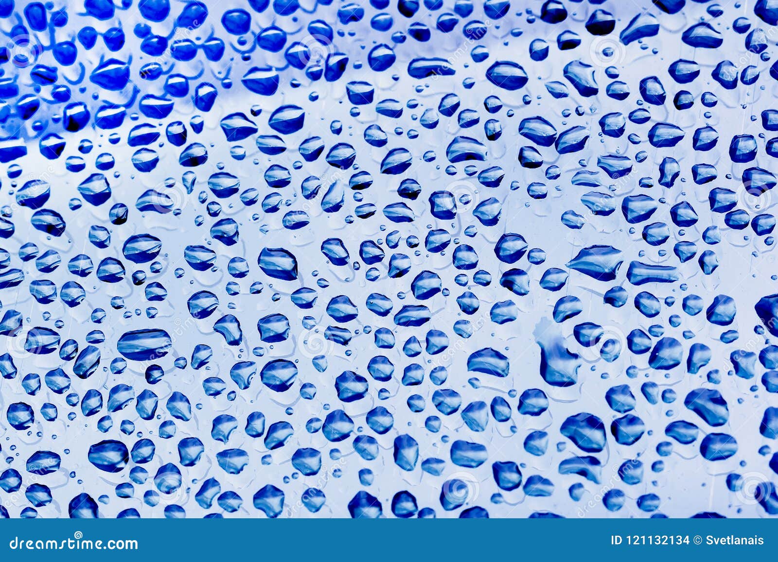 Rain Drops of Blue Color on the Window Glass. Natural Background Stock ...