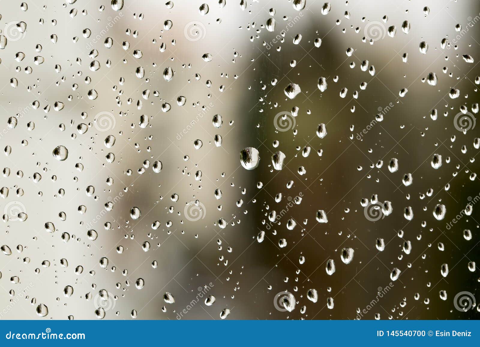 Rain Drops On Window Glasses Surface With Cloudy Background . Natural ...