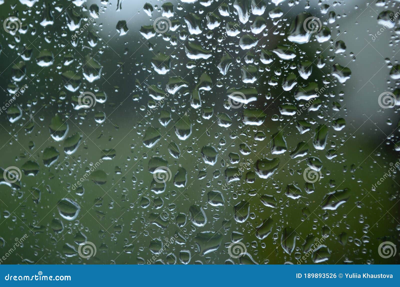 Rain Drops on Window Glasses Surface with Cloudy Background . Natural ...