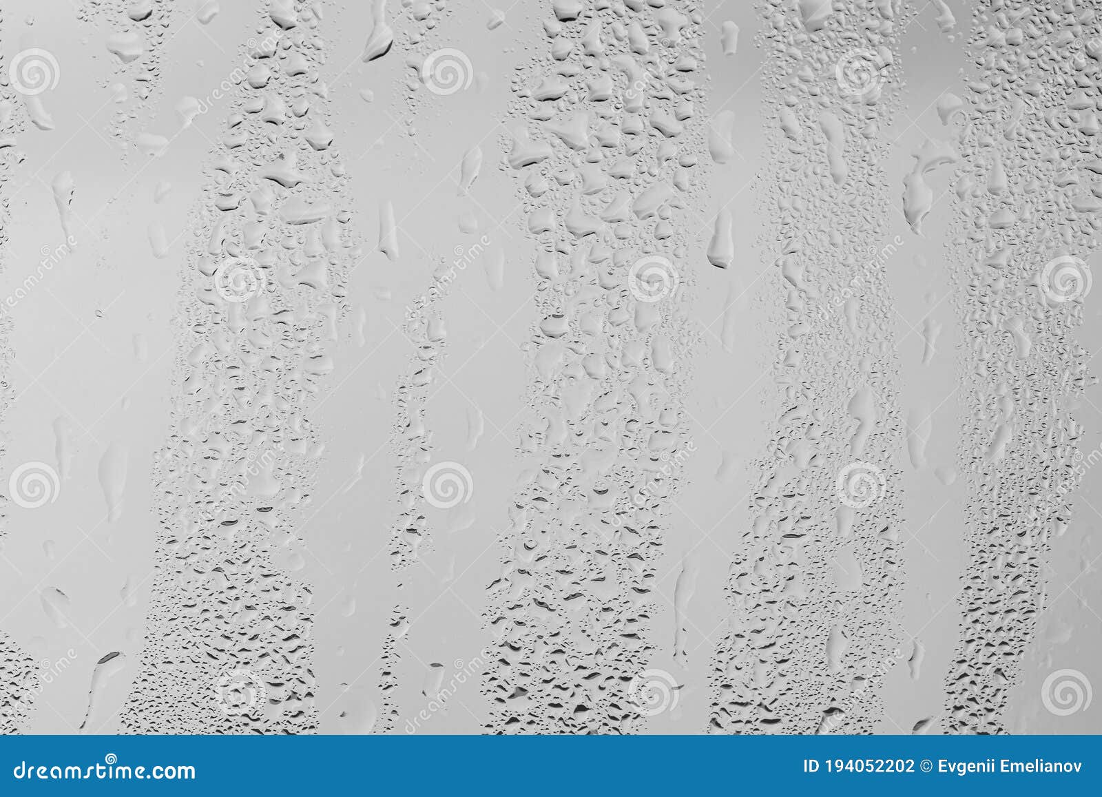 Rain Drops on Window Glasses Surface with Gray Sky Background . Natural ...