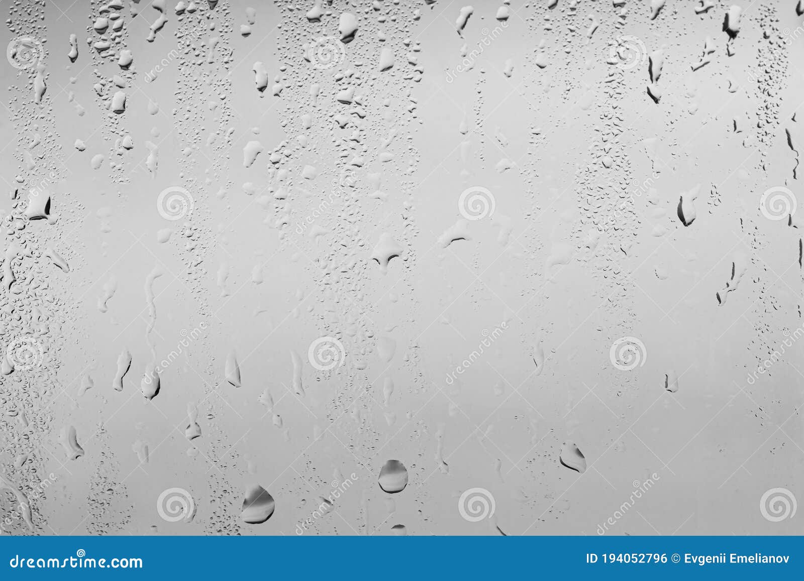Rain Drops on Window Glasses Surface with Gray Sky Background . Natural ...