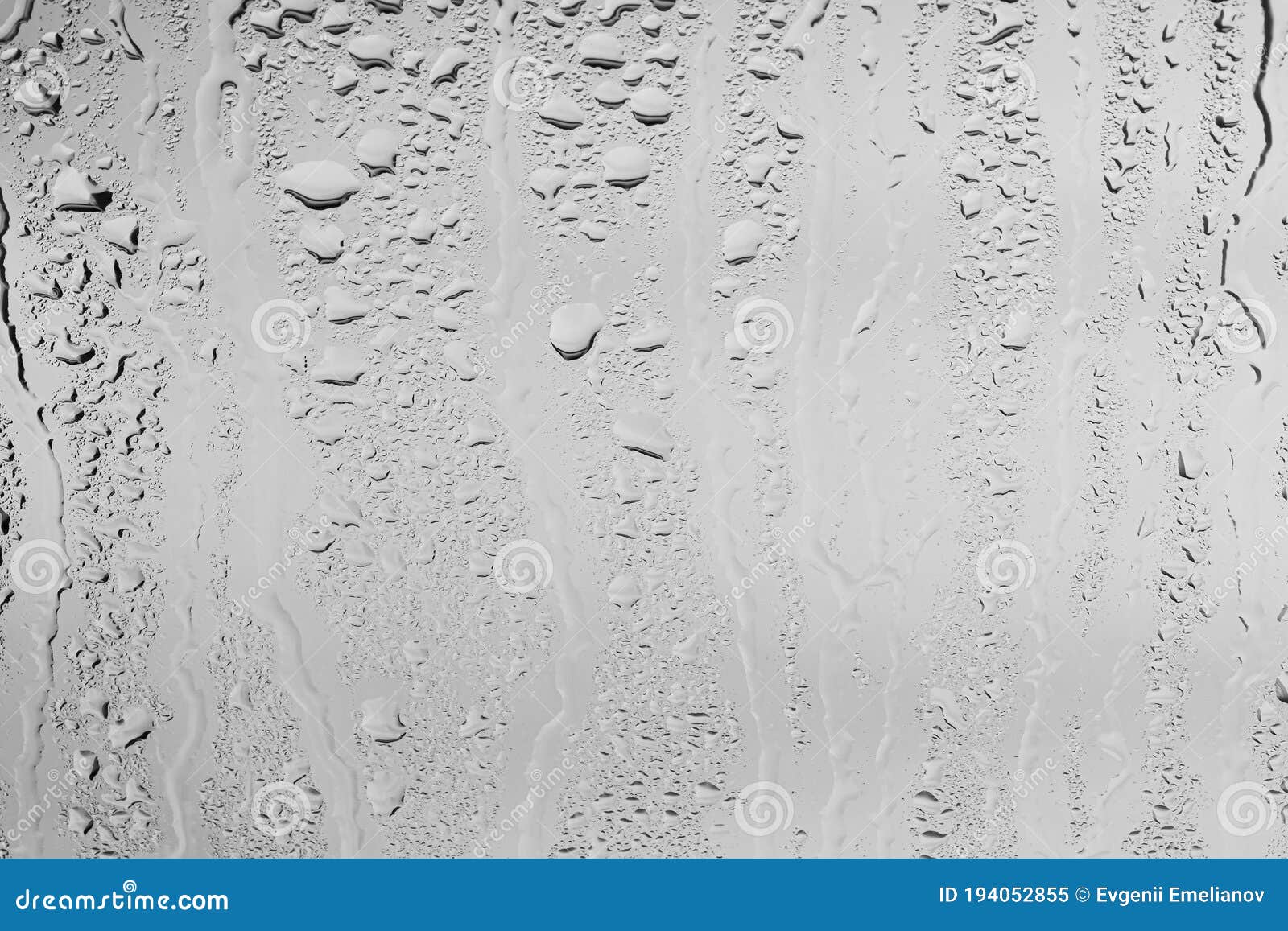 Rain Drops on Window Glasses Surface with Gray Sky Background . Natural ...