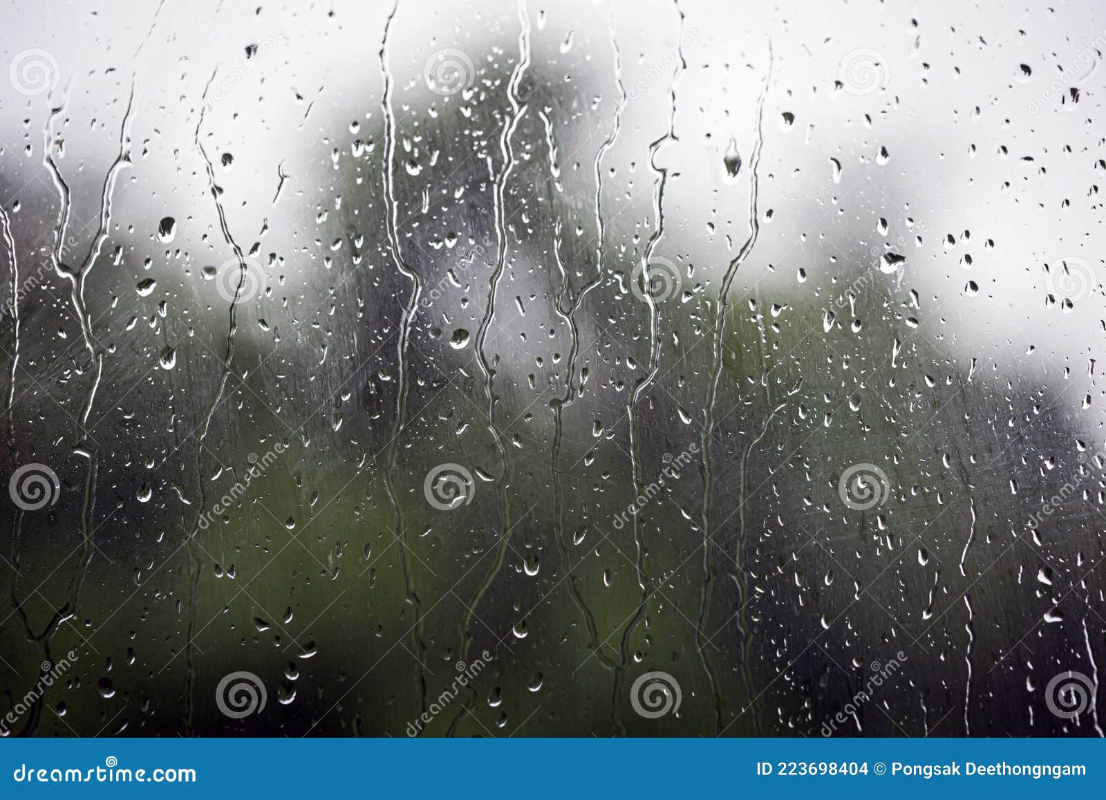 Rain drops on window stock photo. Image of blue, group - 223698404