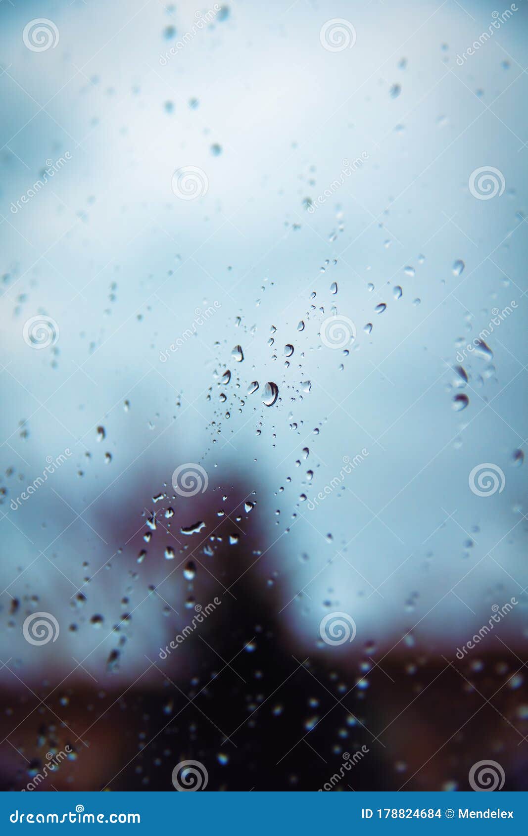 Rain Drops on a Window Surface with Blurry Shadows Stock Photo - Image ...