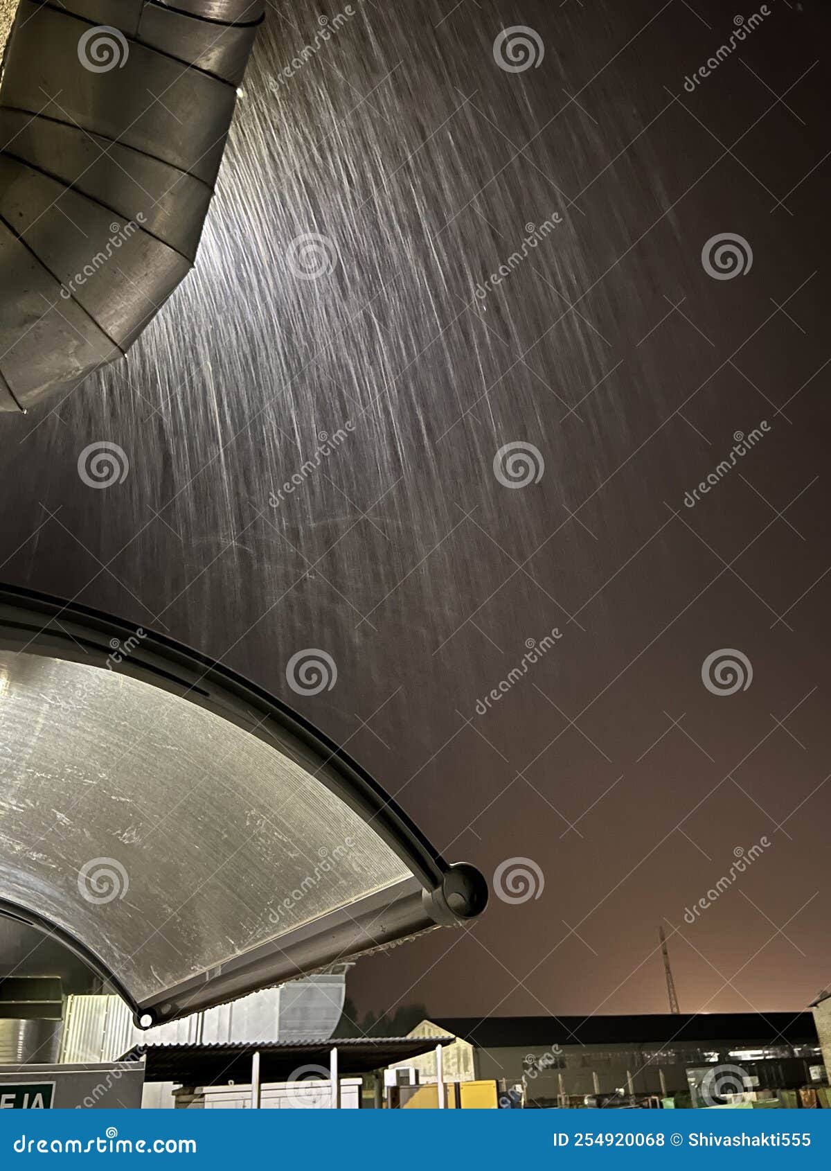 Rain at factory territory stock photo. Image of light - 254920068
