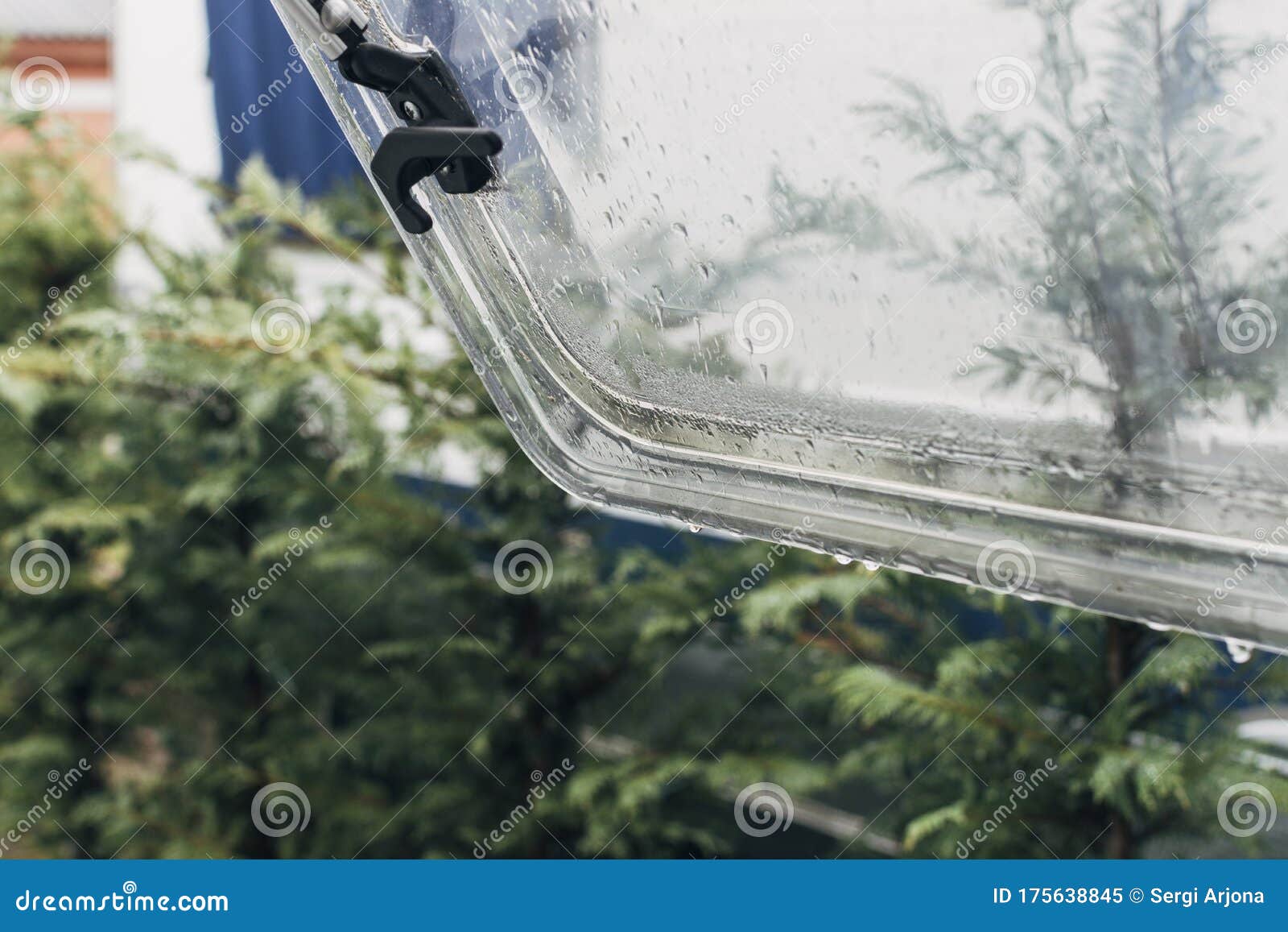 Rain Falling Over an Open Window of a Caravan Stock Image - Image of ...