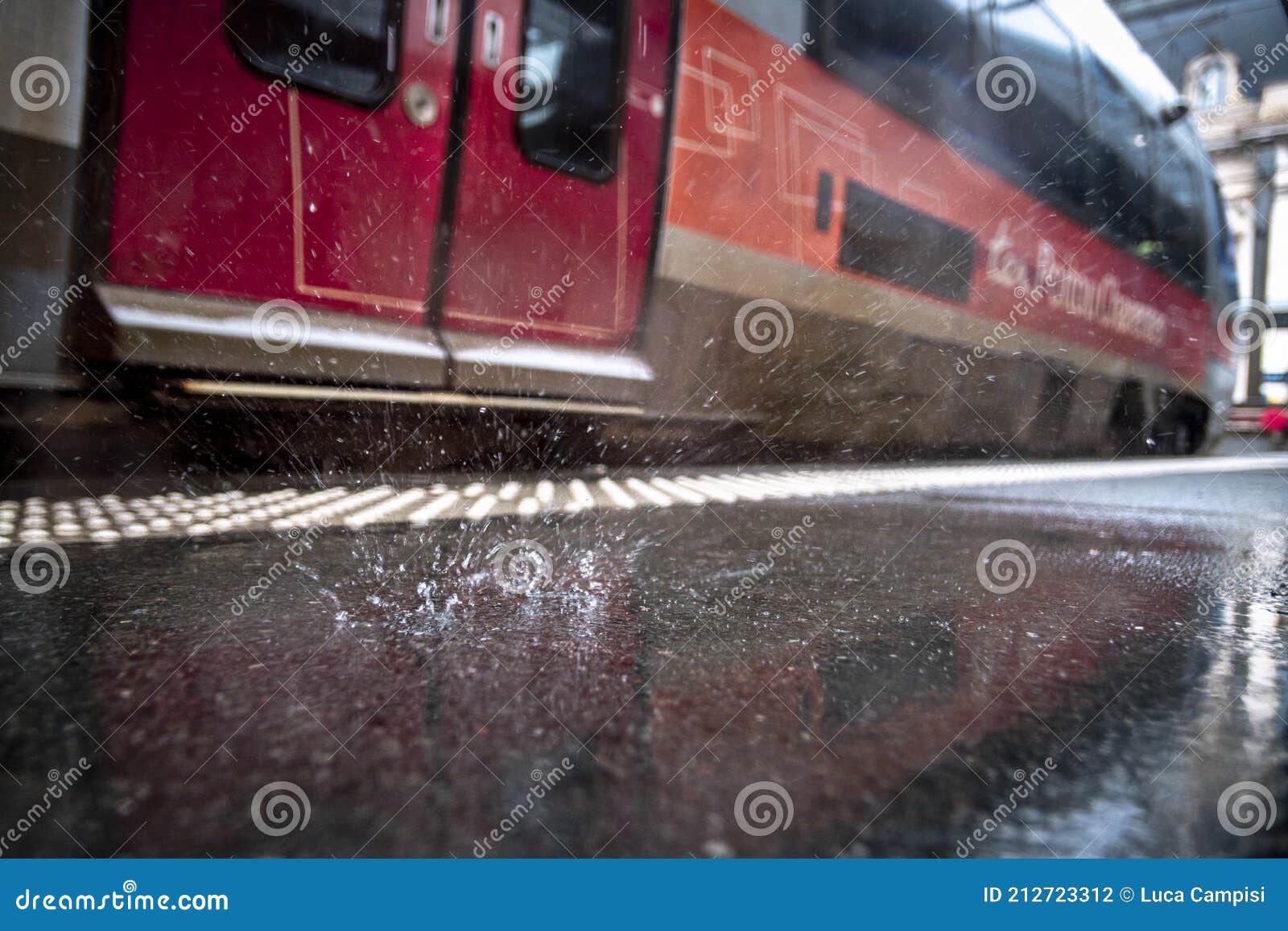 Rain Falling on the Station Platform in Front of a Train Editorial ...