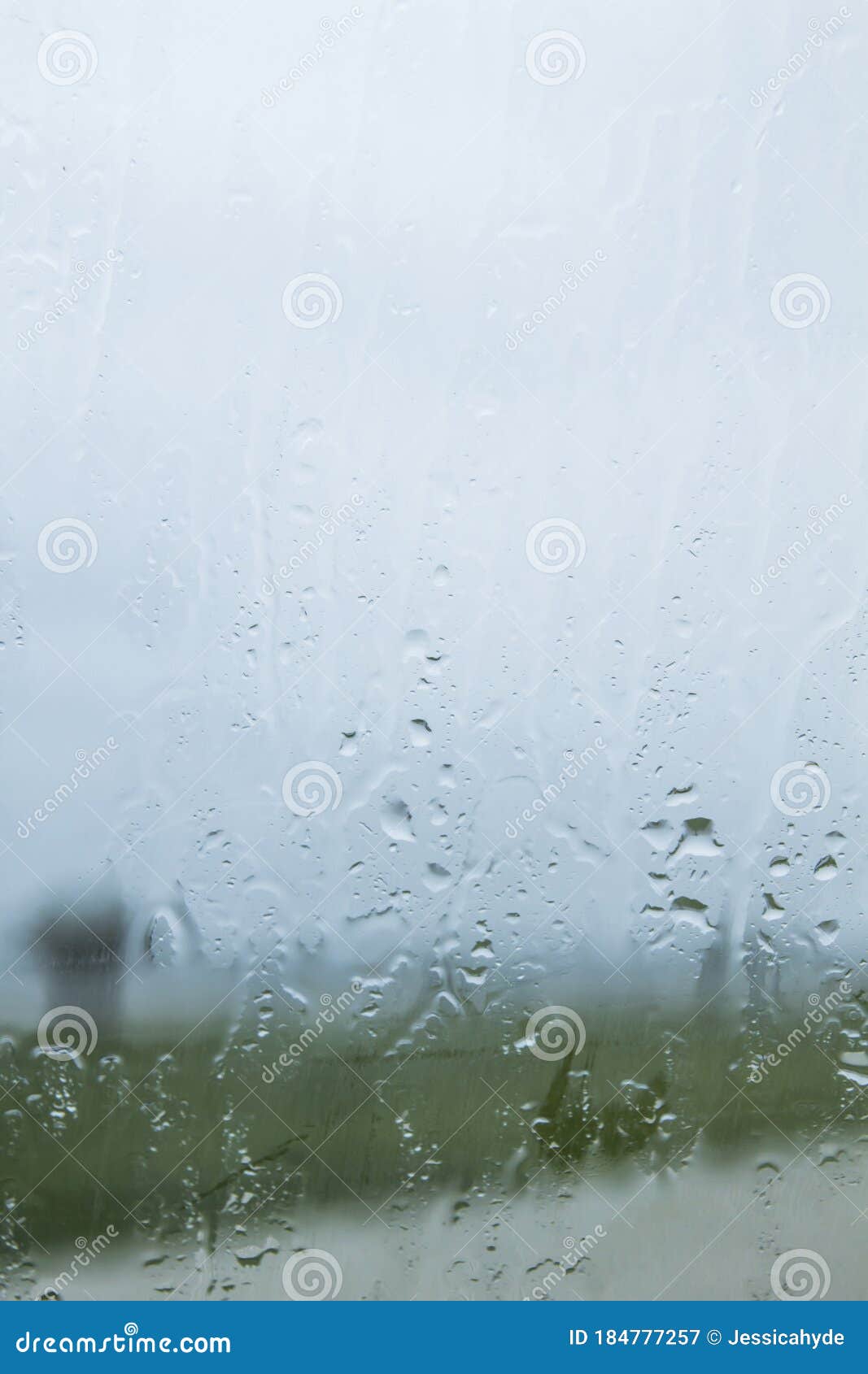 Rain falling in the window stock image. Image of abstract - 184777257
