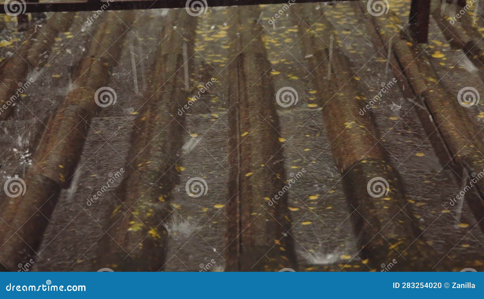 Rain flows down on a roof stock footage. Video of building - 283254020