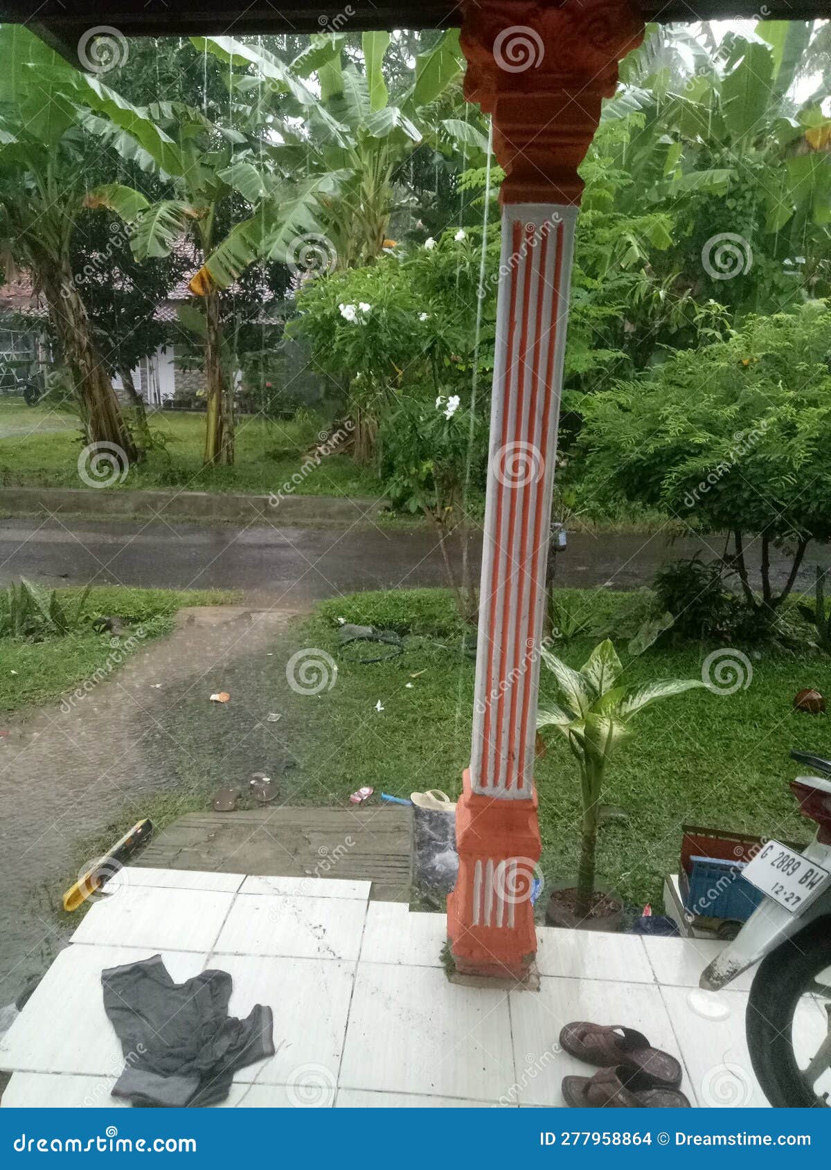 Rain in front of the house editorial stock image. Image of front ...