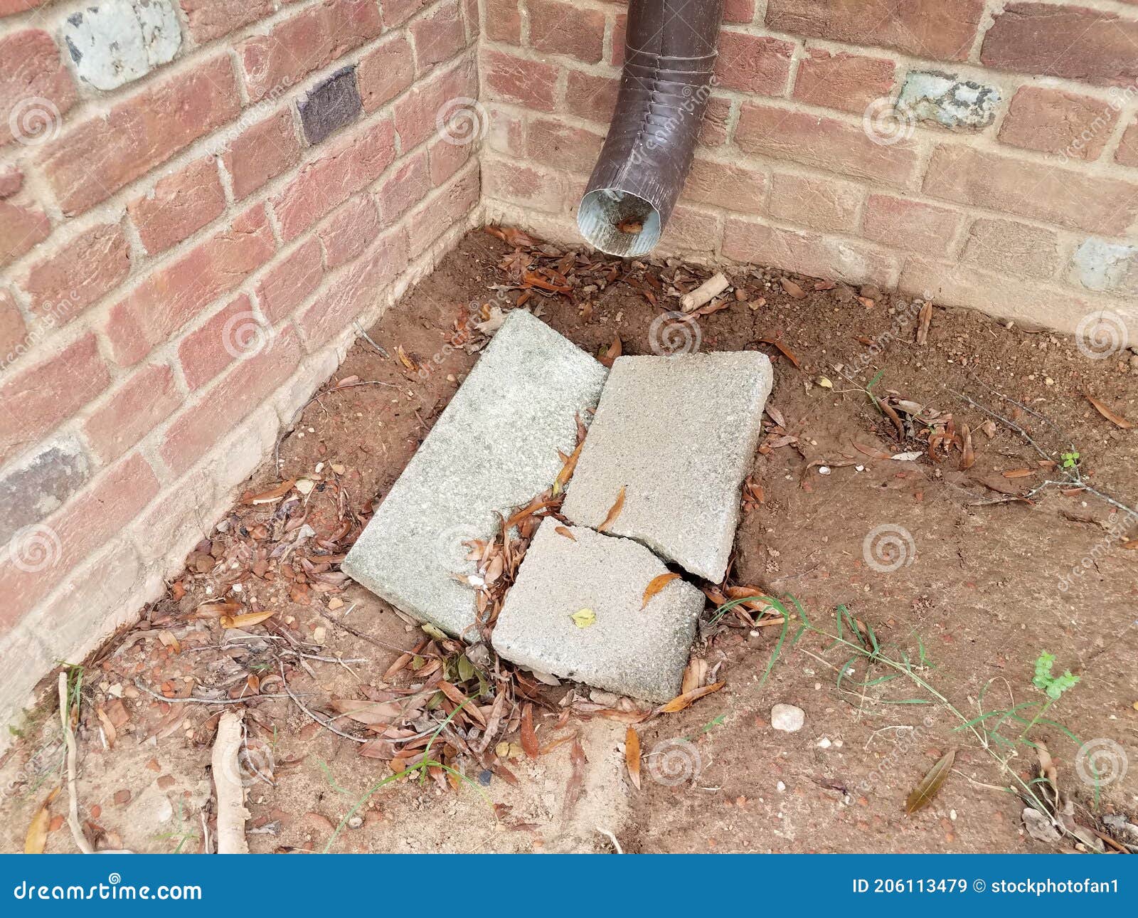 Rain Gutter Downspout and Cement Slab with Brick Wall Stock Image ...