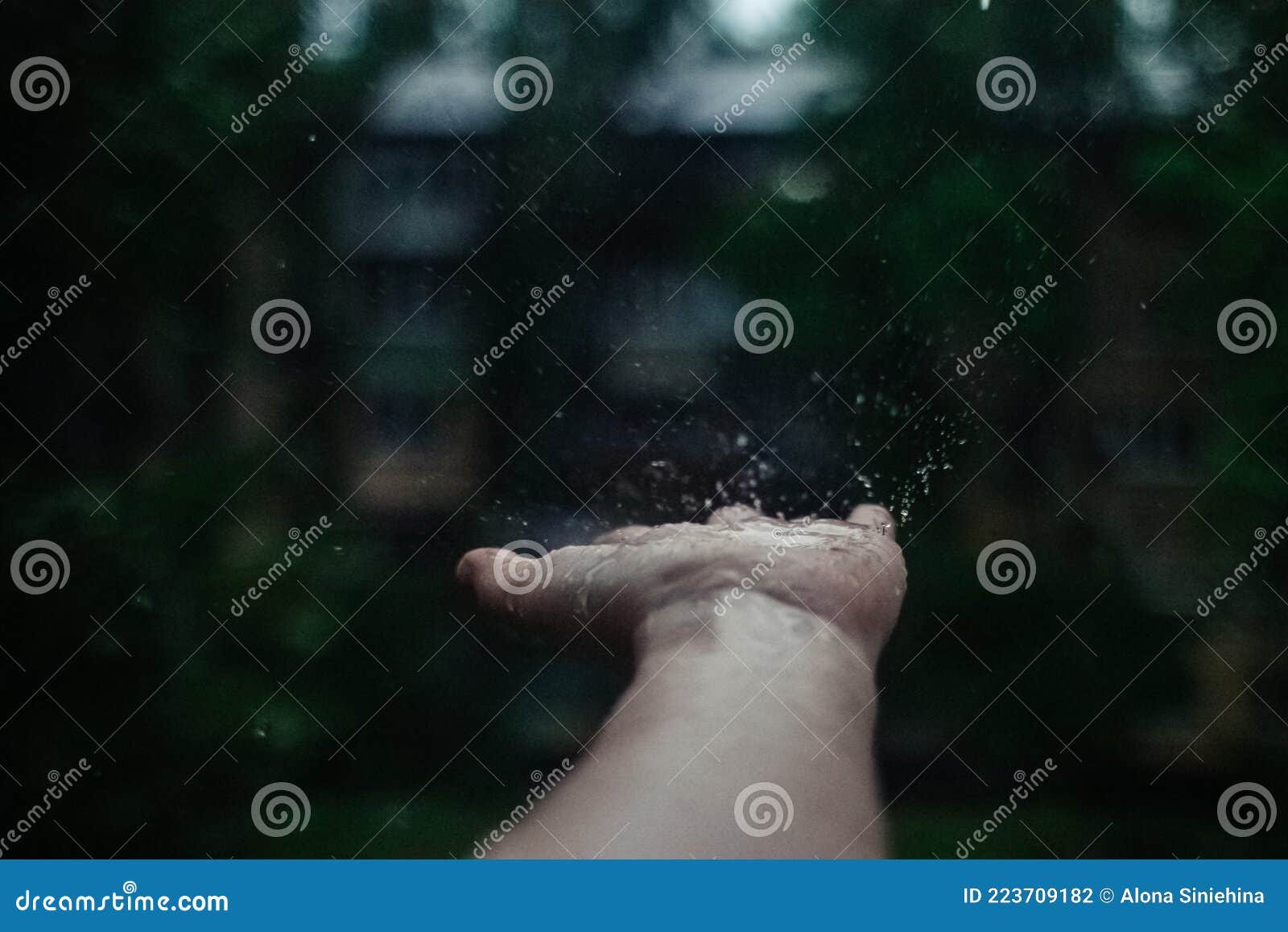 Rain on Hand. Close-up of the Moment when a Stream of Rain Flows into ...