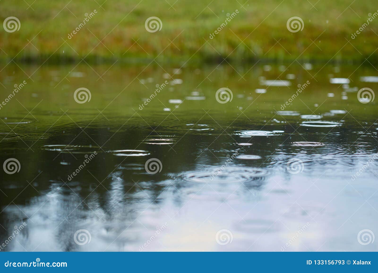 Rain on a lake stock image. Image of abstract, surface - 133156793