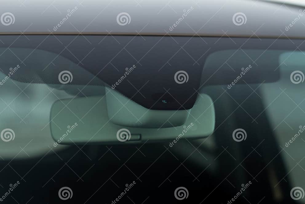 Rain and Light Sensor on the Windshield of the Car. Stock Image - Image ...