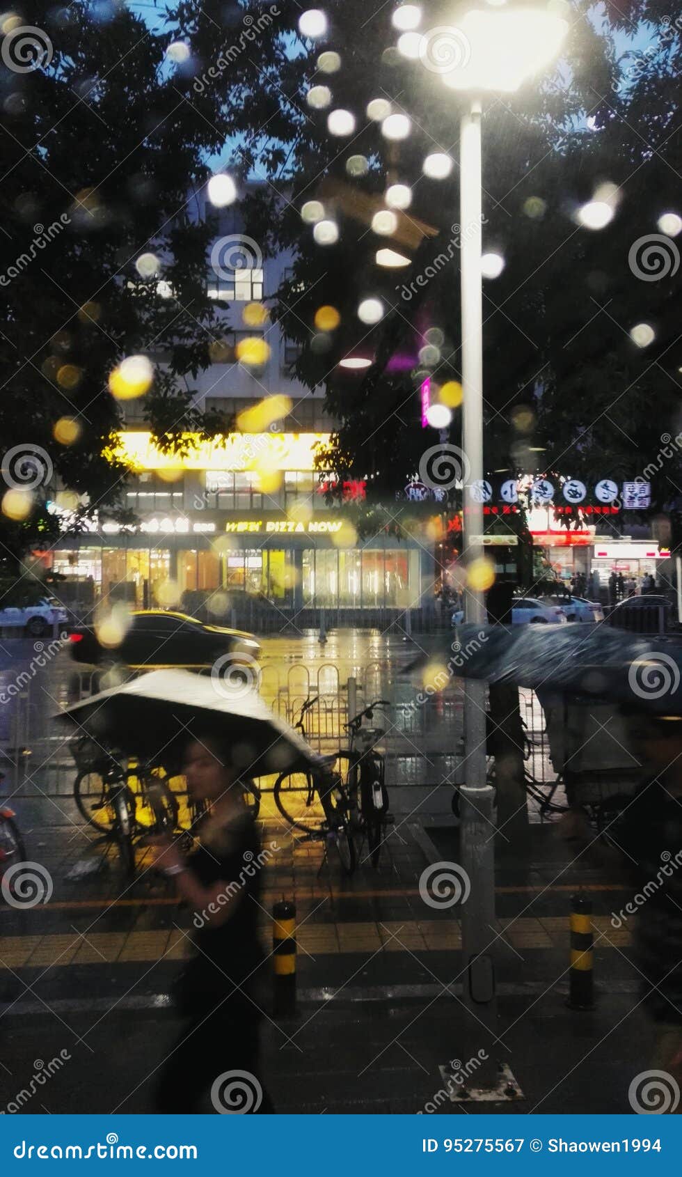 Rain night in beijing editorial photography. Image of umbrellas - 95275567