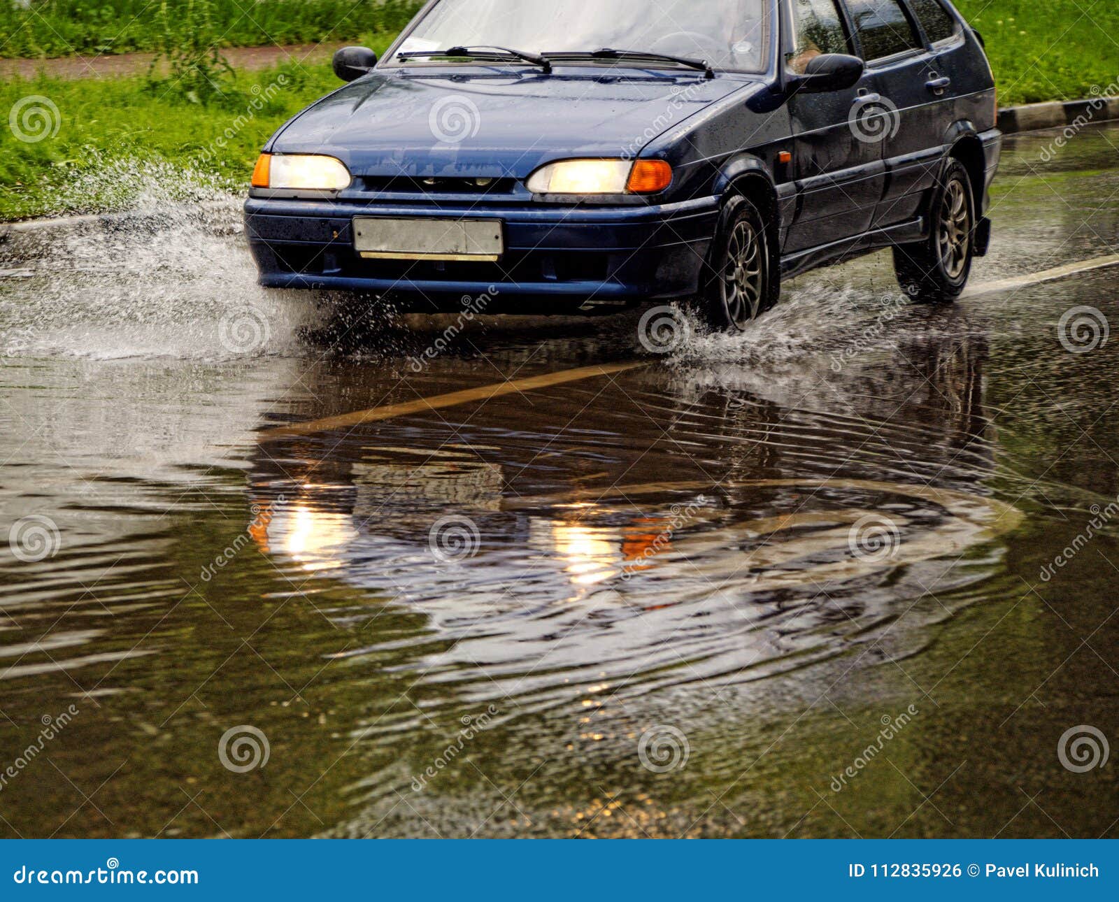 Rain Puddle and Car on the Street Stock Photo - Image of splashes, city ...