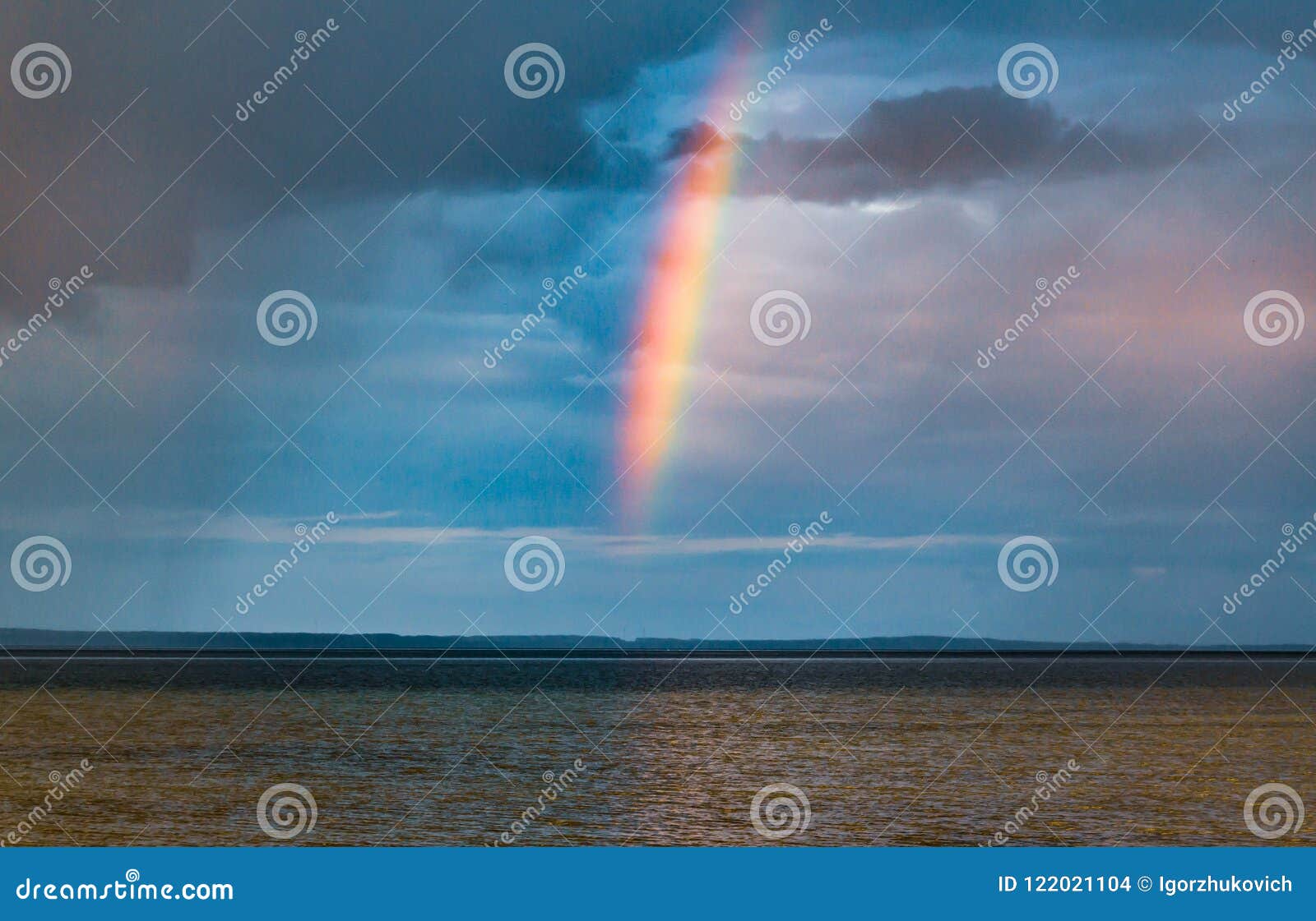 Rain and Rainbow Over the Water Stock Photo - Image of gray, peaceful ...