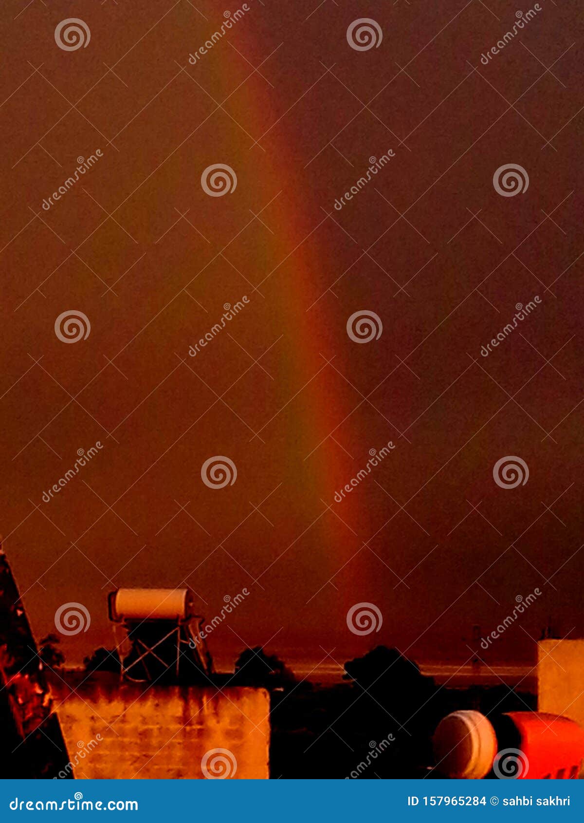Rain stock photo. Image of sunset, rain, color, rainbow - 157965284
