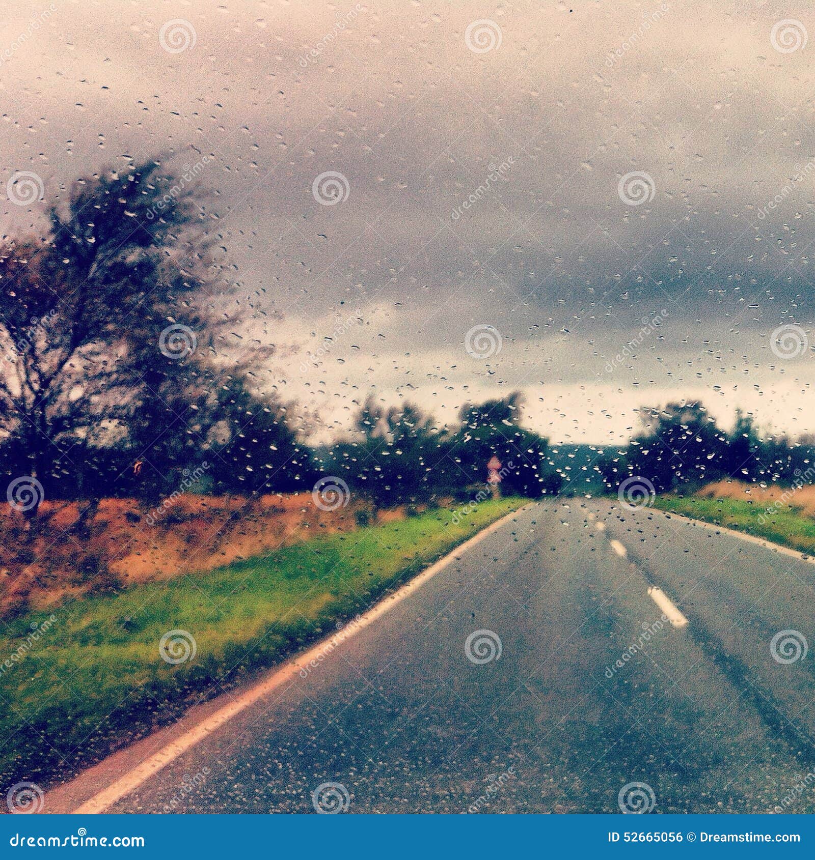 Rain on the road stock photo. Image of cloud, inside - 52665056