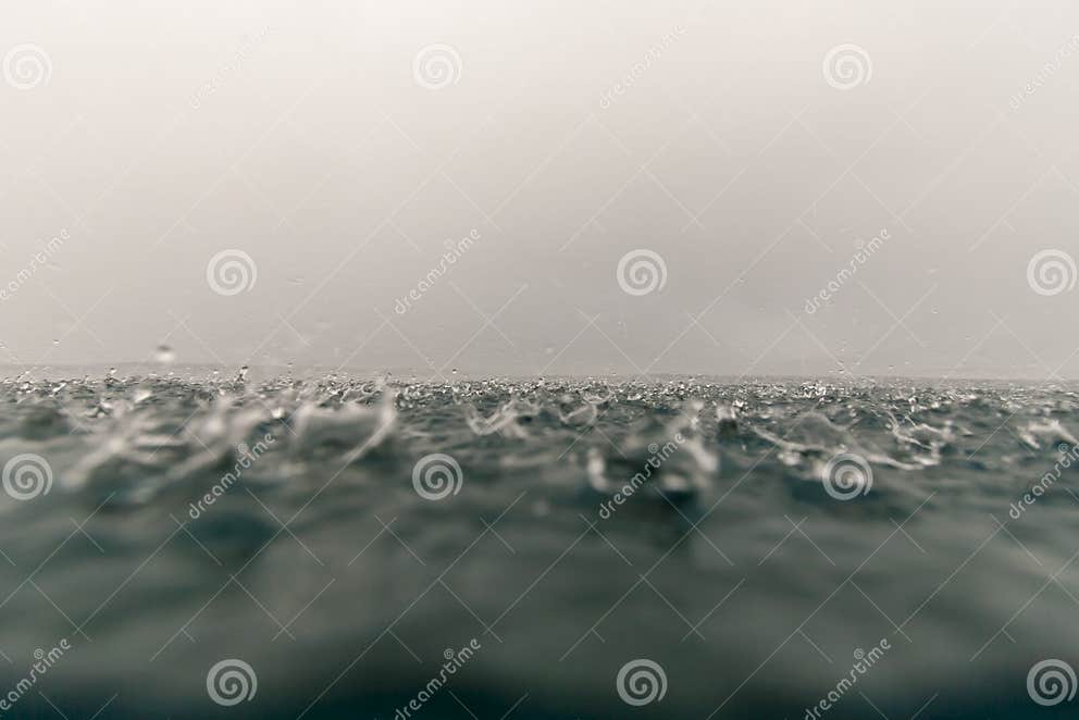 Rain on Sea stock image. Image of wave, storm, rain, sunlight - 31756067