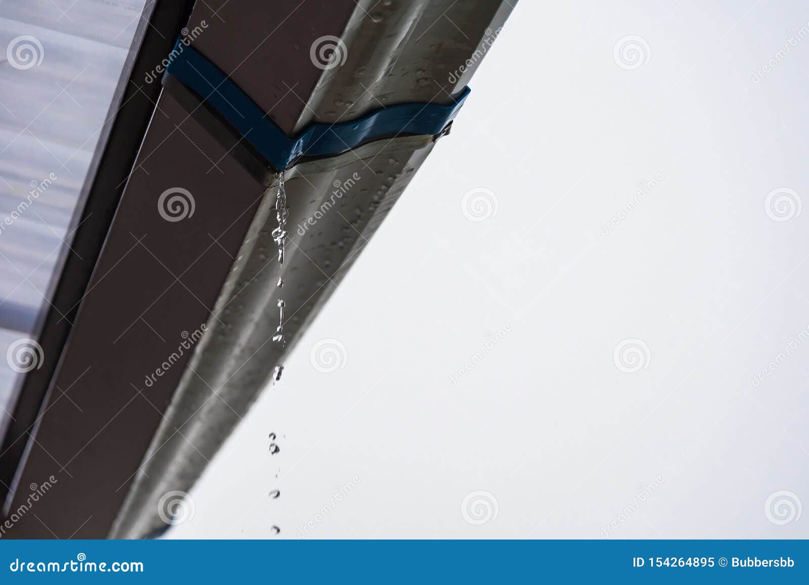 Rain Storm with Metal Sheet Roof,rainwater Flows Down the Roof Stock ...