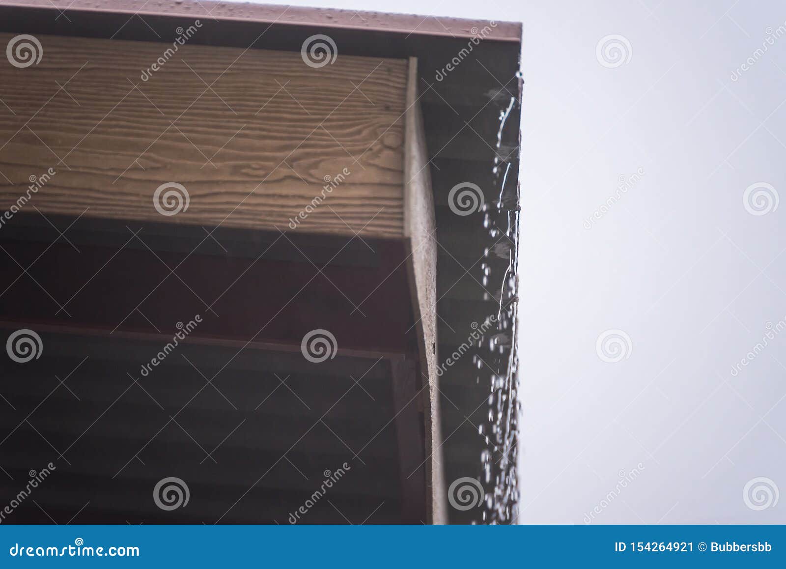 Rain Storm with Metal Sheet Roof,rainwater Flows Down the Roof Stock ...