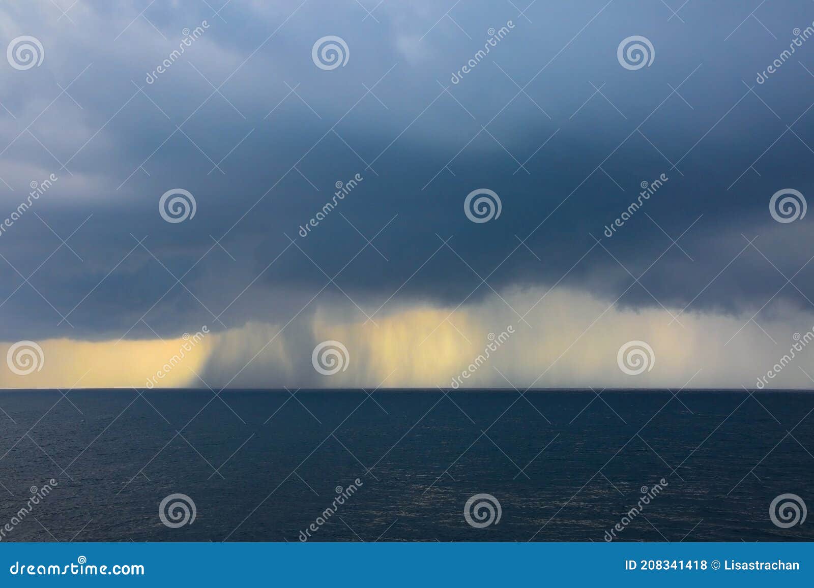 Rain & Storms Over the Ocean, on a Grey Cloud Day at Sea Stock Photo ...