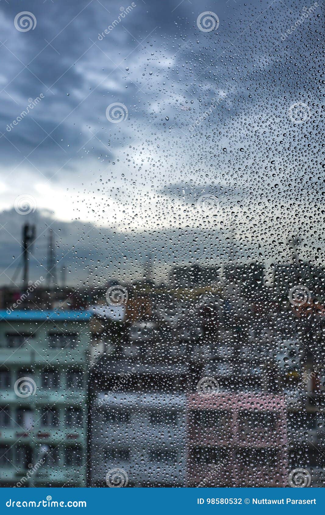 Rain / Water Drop of Rain on Glass with Building in City Background ...